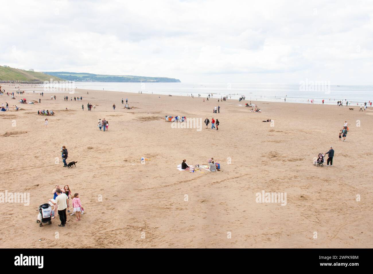 Whitby beach in the summer Stock Photo - Alamy