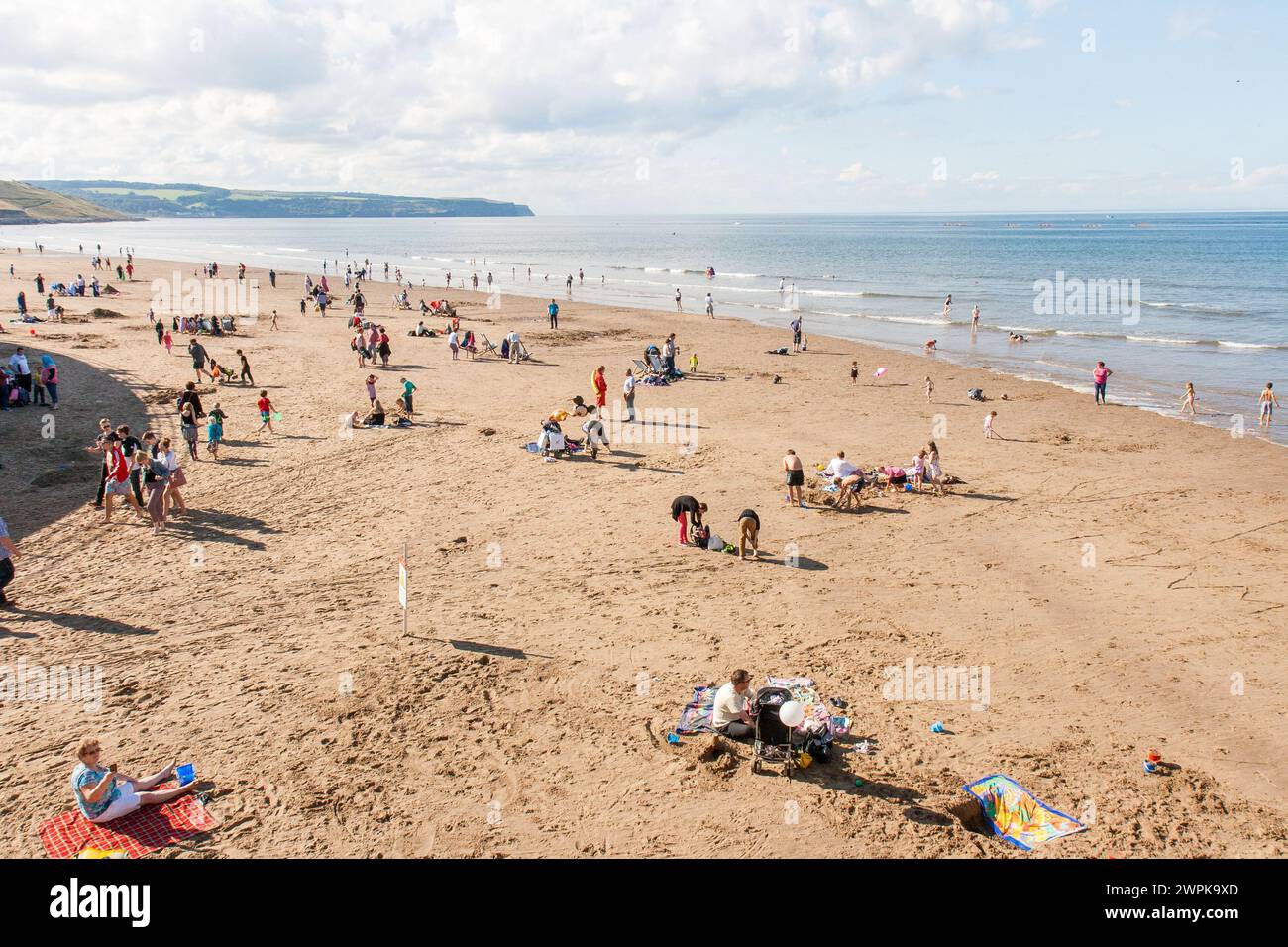 Whitby beach in the summer Stock Photo - Alamy