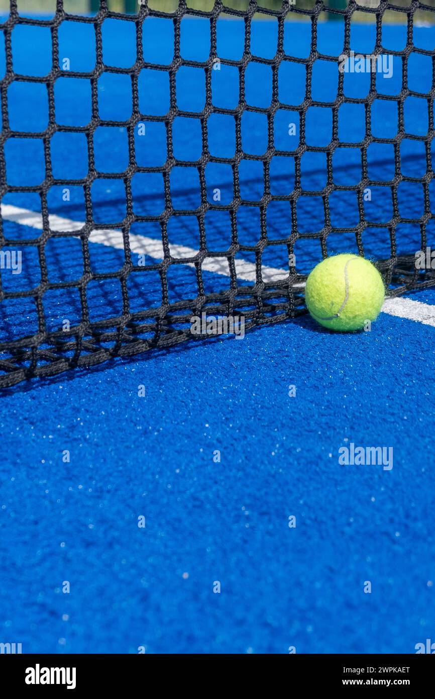 ball next to the net of a paddle tennis court Stock Photo - Alamy