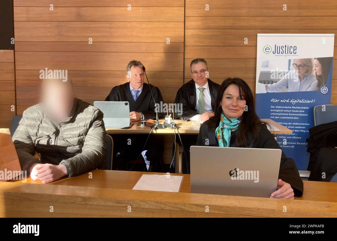 08 March 2024, Bavaria, Traunstein: The defendant (l) sits next to his ...