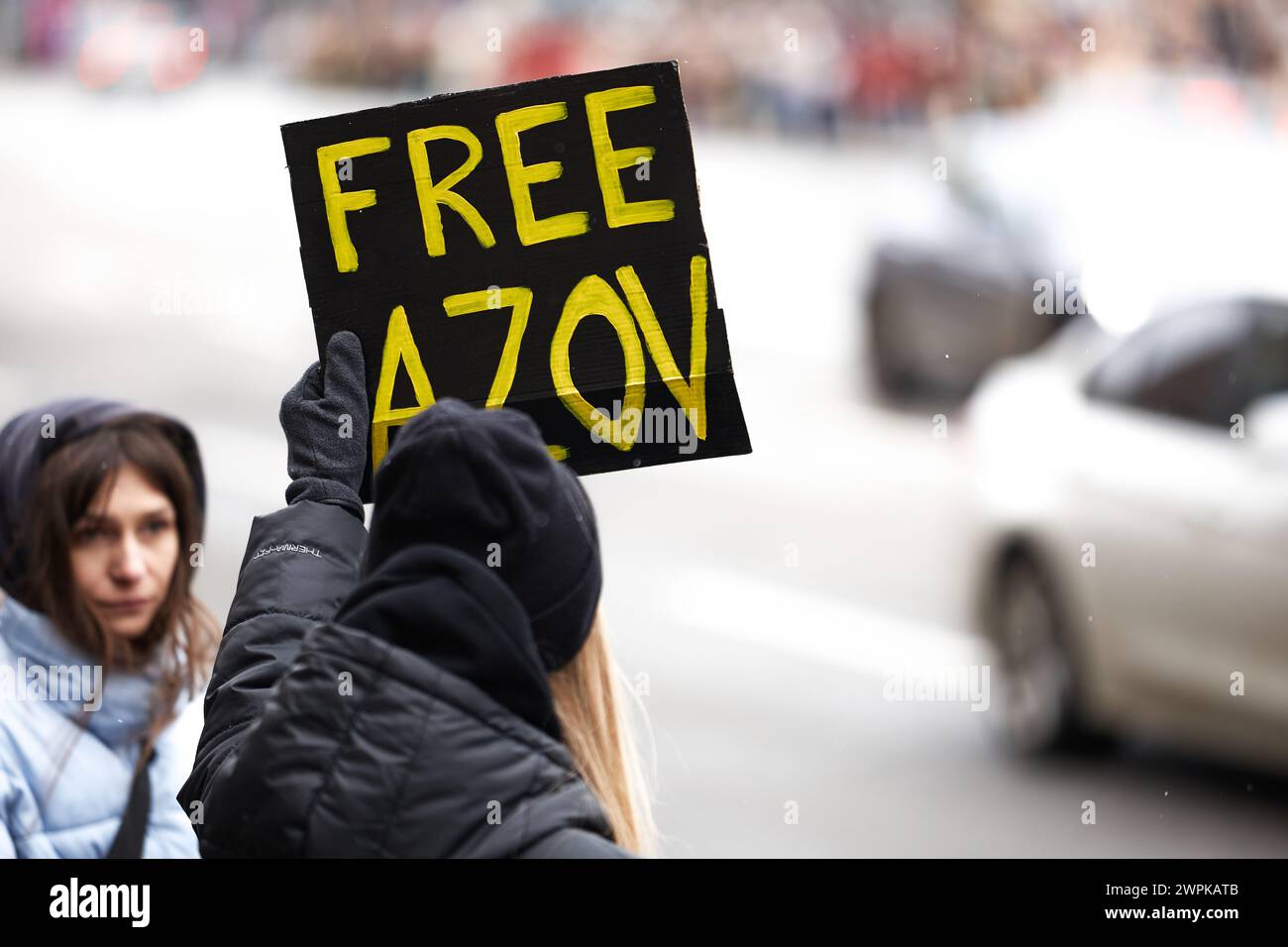 Ukrainian woman show a banner "Free Azov" on a public rally dedicated ...
