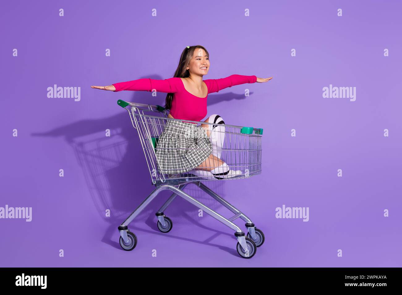 Full length photo of funky excited lady dressed top flying arms sides ...