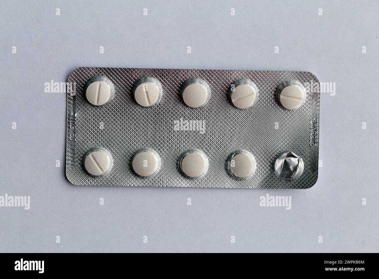 No logo white tablets. Different pills can be used in healthcare to ...