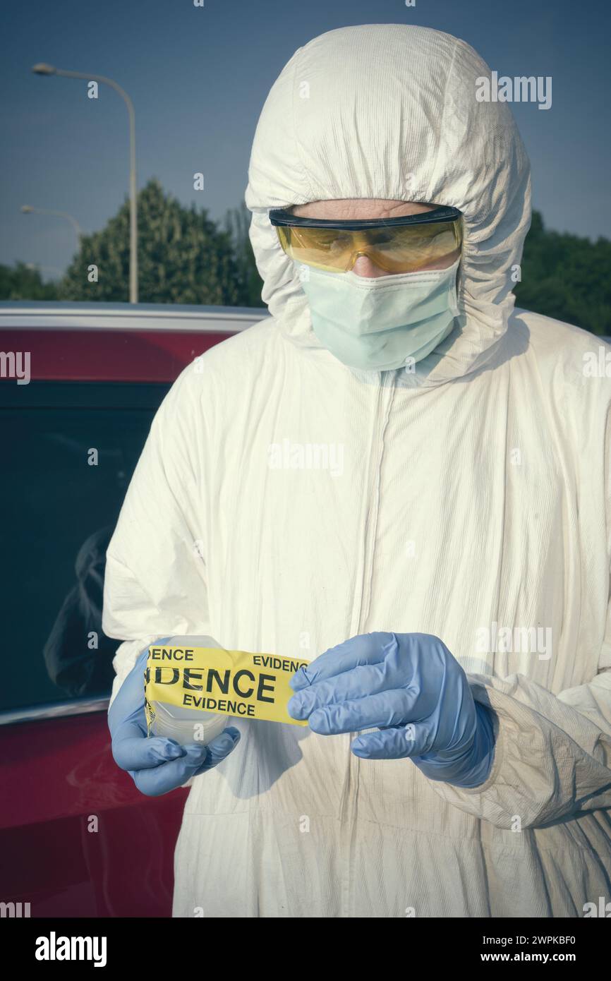 Crime scene investigation - collecting of evidences of soil samples on ...
