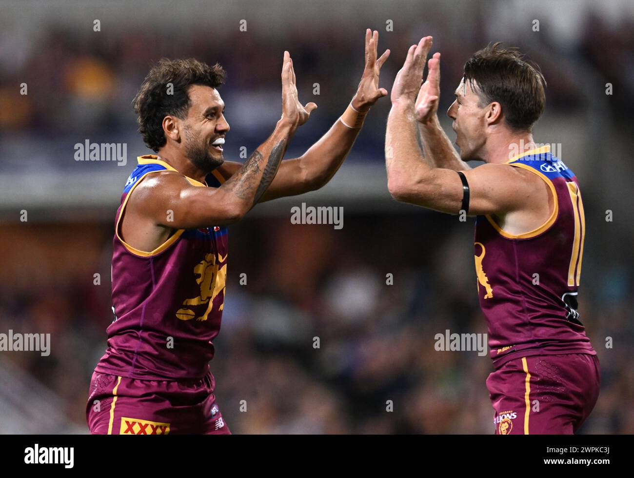 Brisbane, Australia. 08th Mar, 2024. Callum Ah Chee (left) of the Lions ...