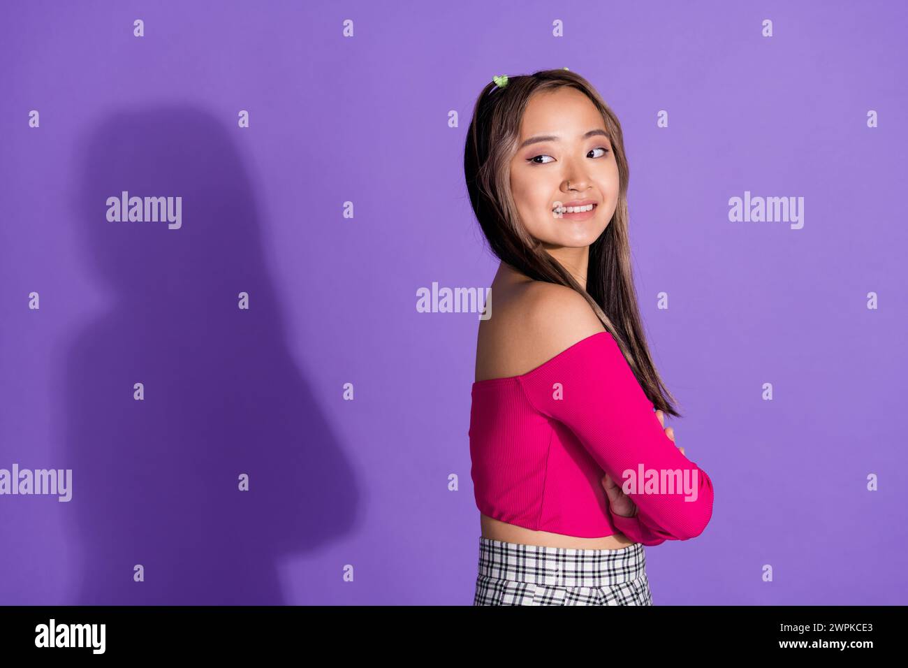 Side profile photo of dreamy girl with tails dressed pink top arms ...