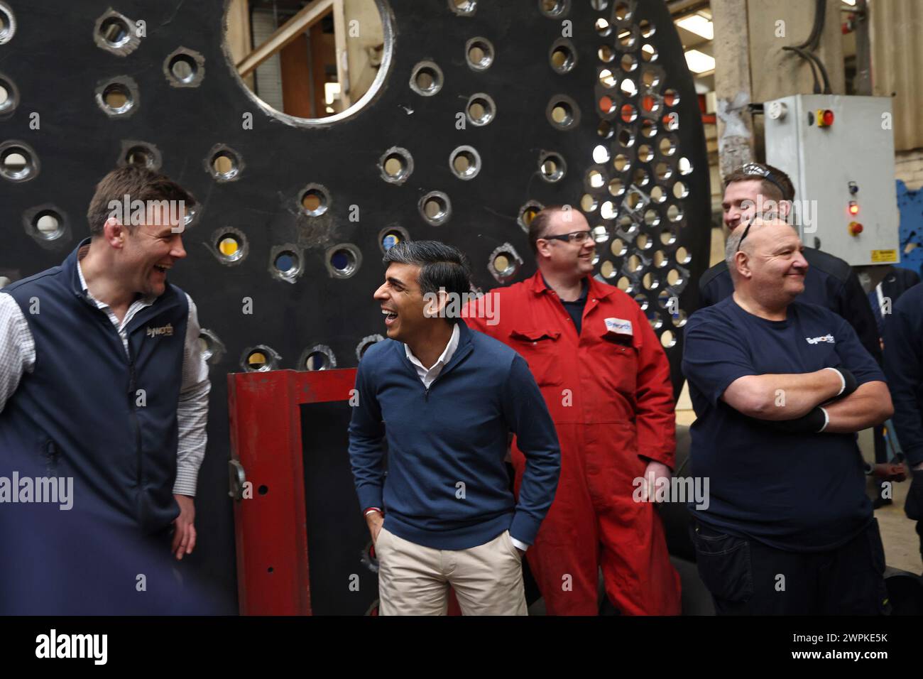 Prime Minister Rishi Sunak talks to staff during a visit to Byworth ...