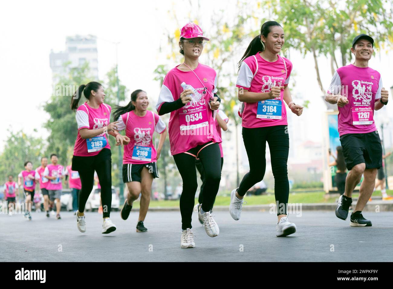 Phnom Penh, Phnom Penh. 8th Mar, 2024. People participate in the Women Run 10k event, an annual ...