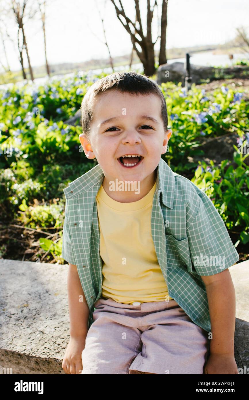 Boy flowers behind hi-res stock photography and images - Alamy