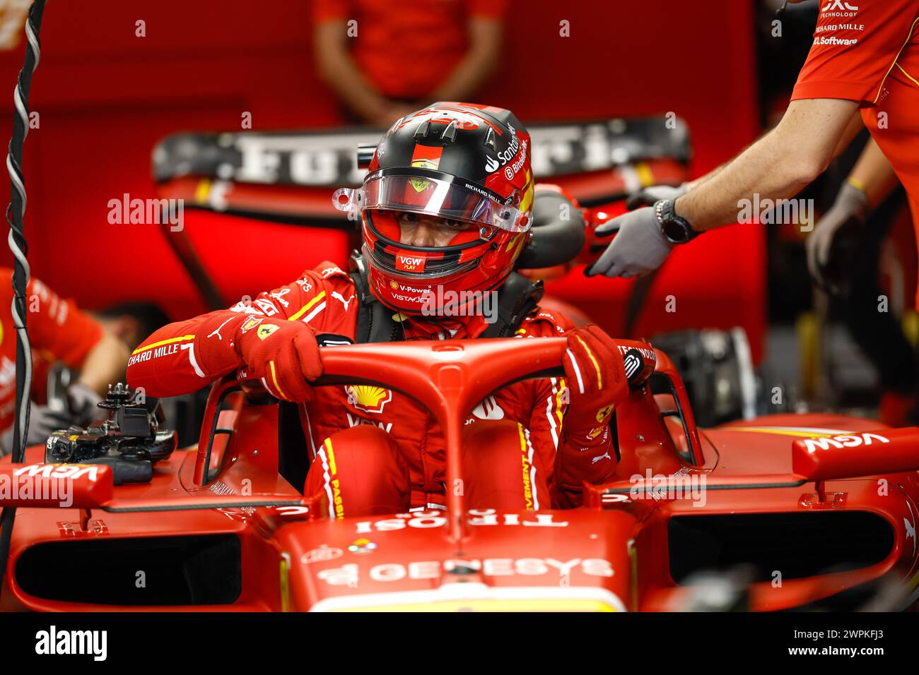 55 SAINZ Carlos (spa), Scuderia Ferrari SF-24, action, stand, pit lane ...