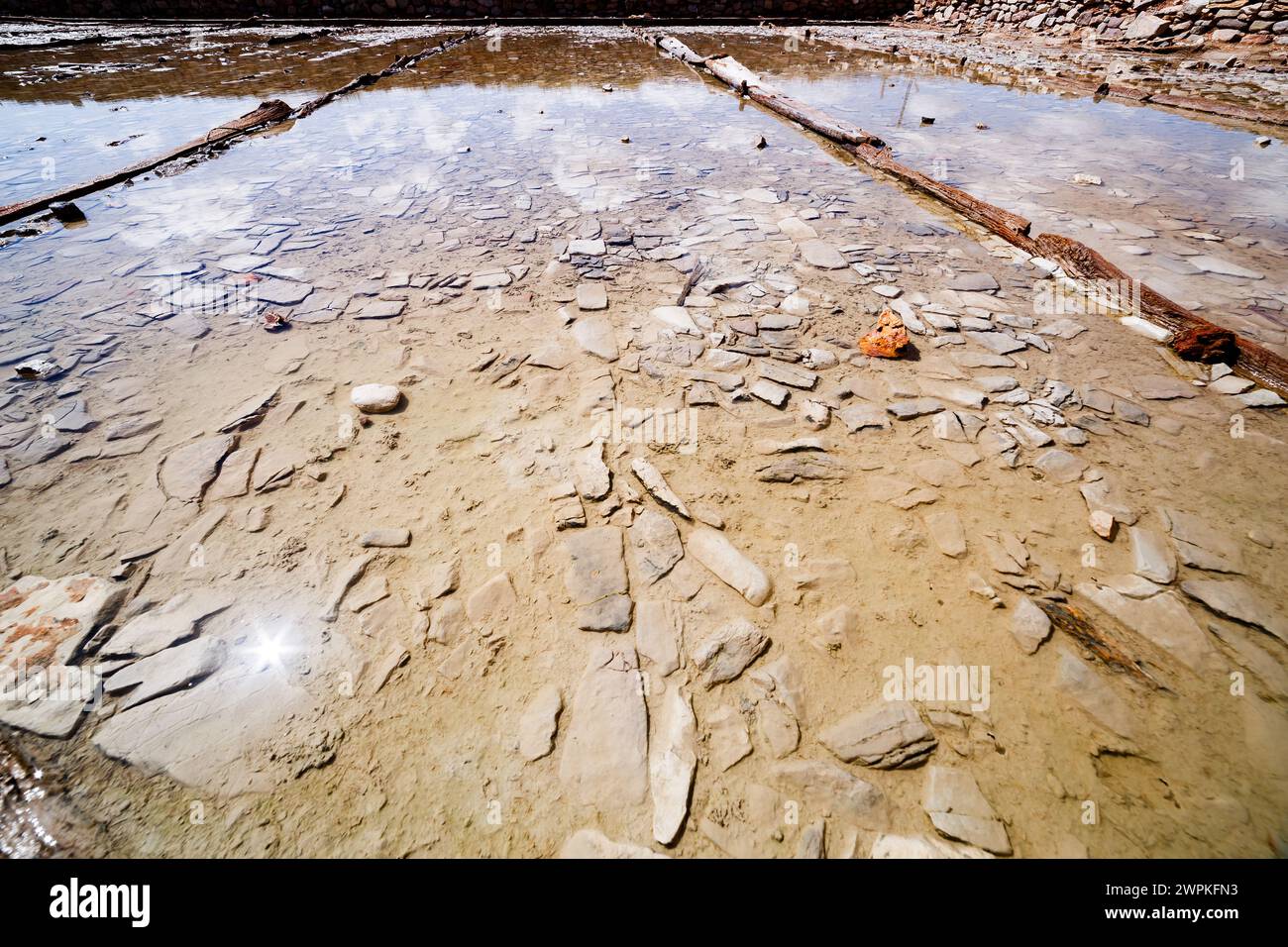Stones in the drying pool of the Pinilla salt flats Stock Photo - Alamy