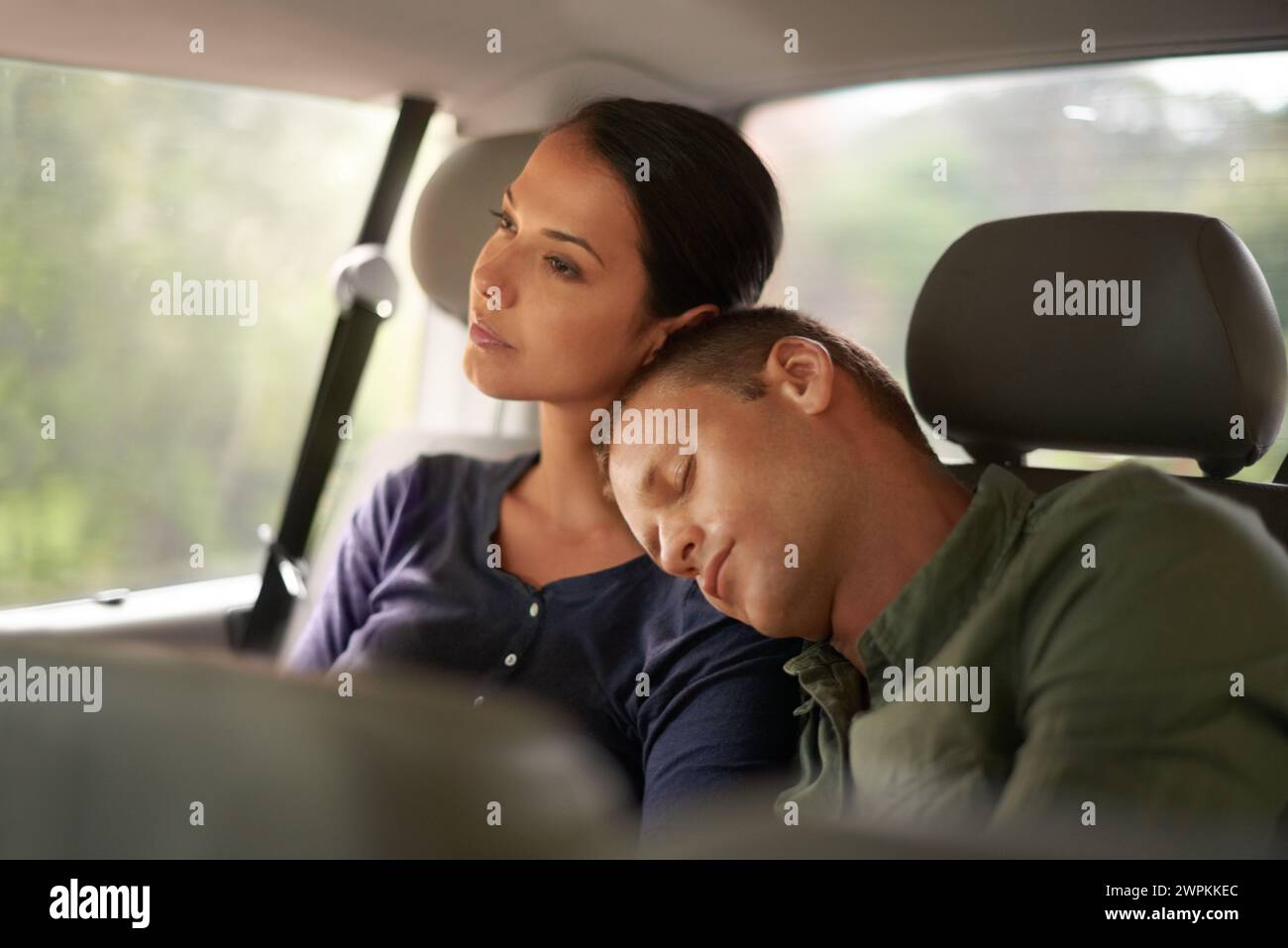 Sleeping in backseat of car hi-res stock photography and images - Alamy