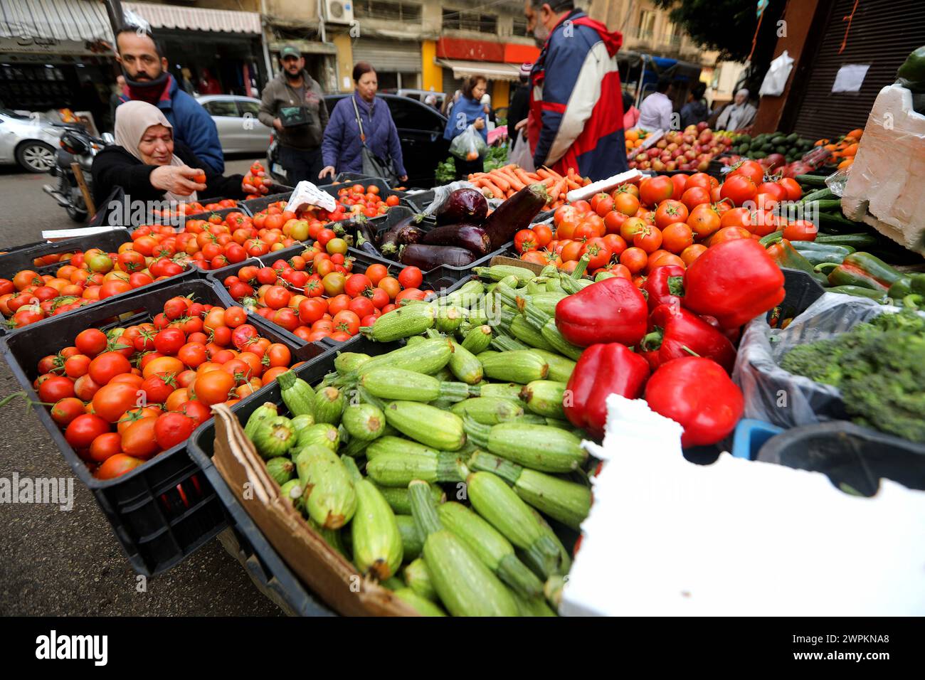 Beirut. 7th Mar, 2024. Local people buy goods ahead of Ramadan at a ...