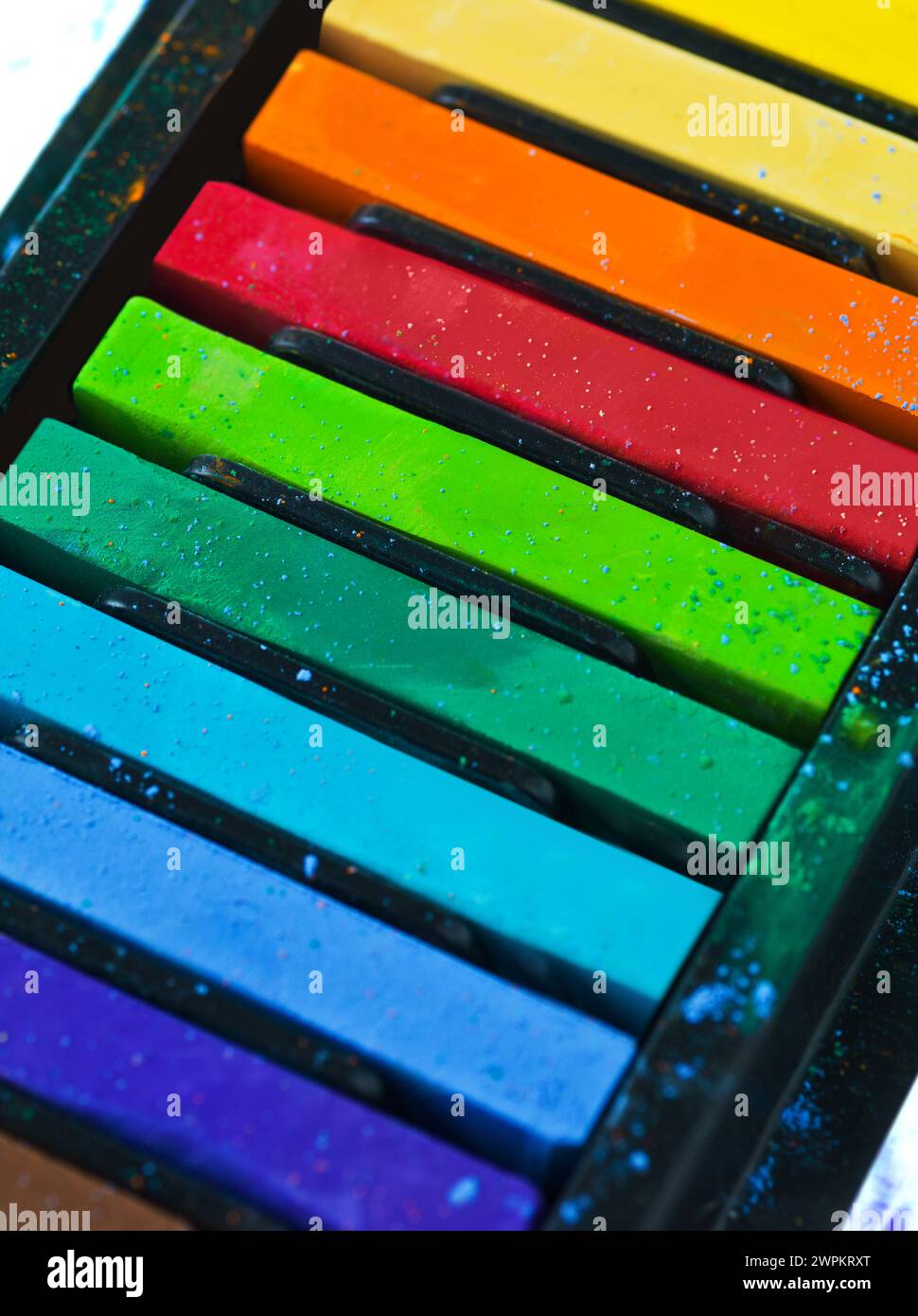 Paint, pastel and color chalk in studio for rainbow or vibrant ...