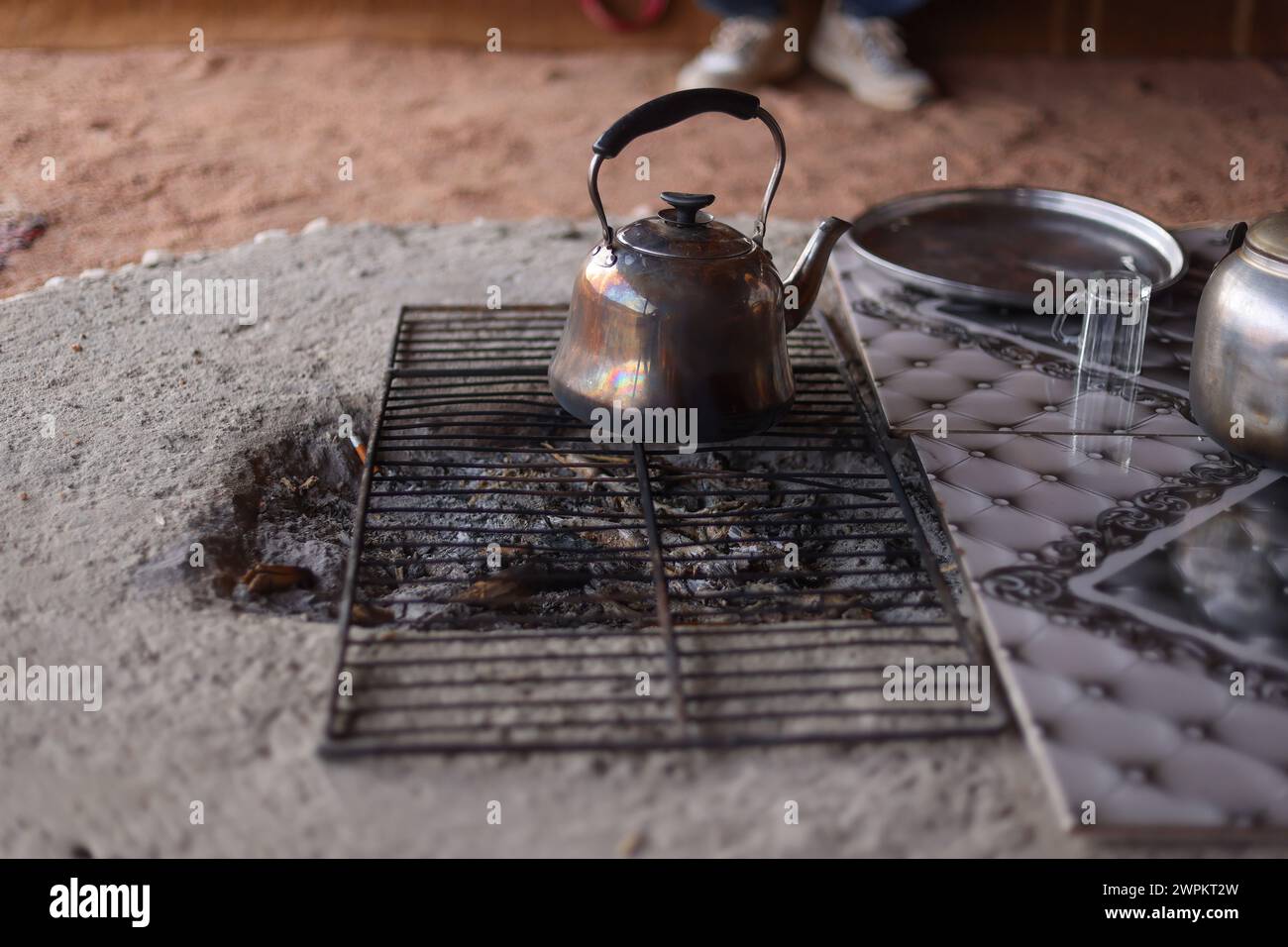the process of boiling water in the forest while camping Stock Photo ...