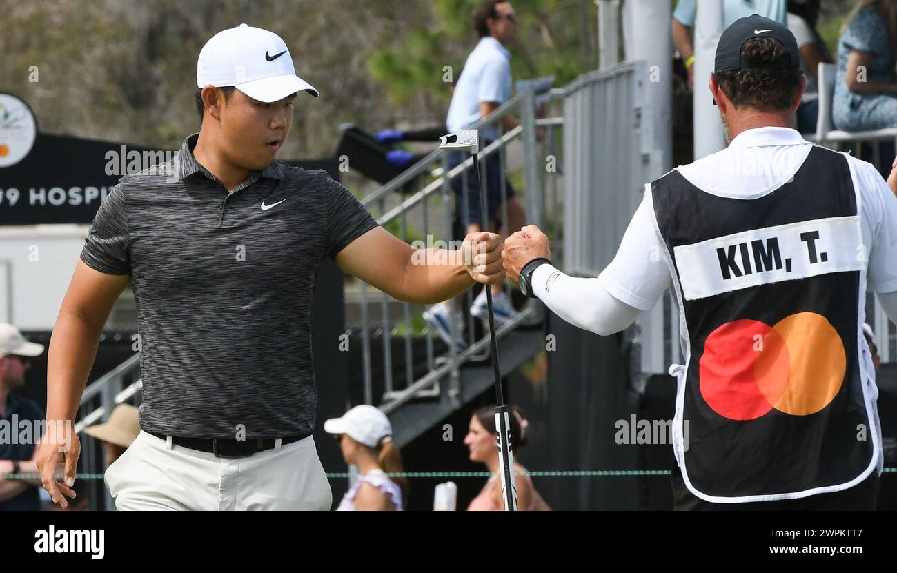 Orlando, United States. 07th Mar, 2024. Tom Kim of Korea fist bumps ...