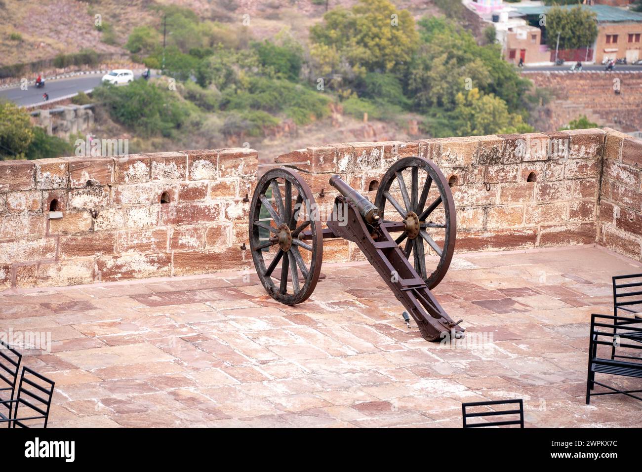 Small cannon with wheels placed along the walls of the rajput castle in ...
