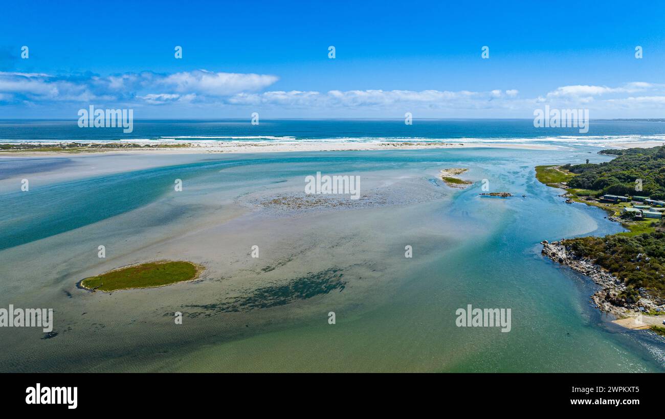 Aerial of the turquoise waters of the Klein River Lagoon, Hermanus ...