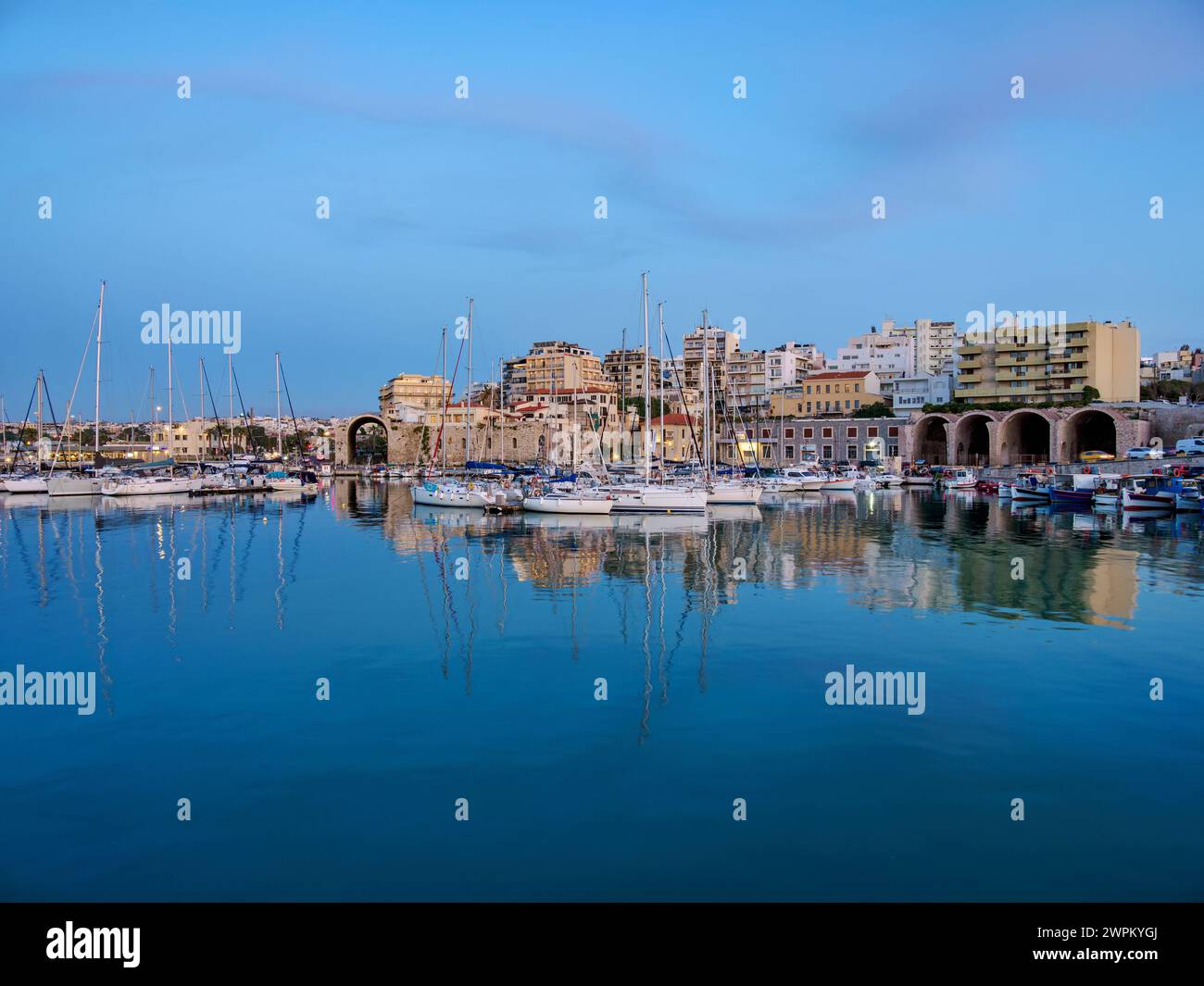 Venetian Dockyards at the Old Port at dusk, City of Heraklion, Crete ...