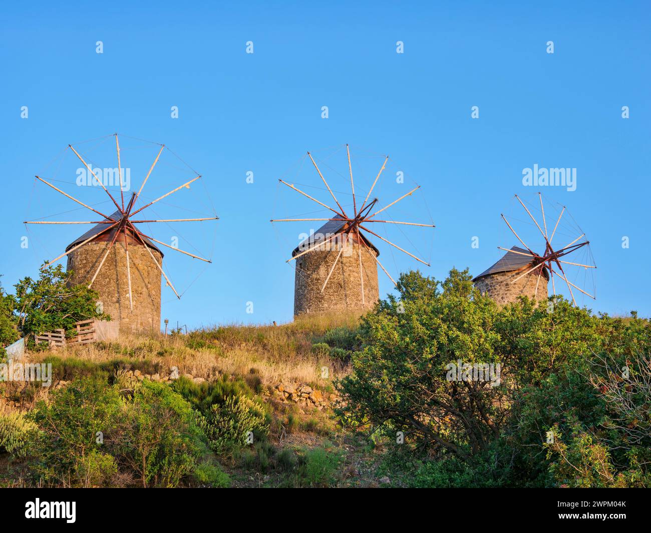 Windmills of Patmos Chora at sunset, Patmos Island, Dodecanese, Greek ...