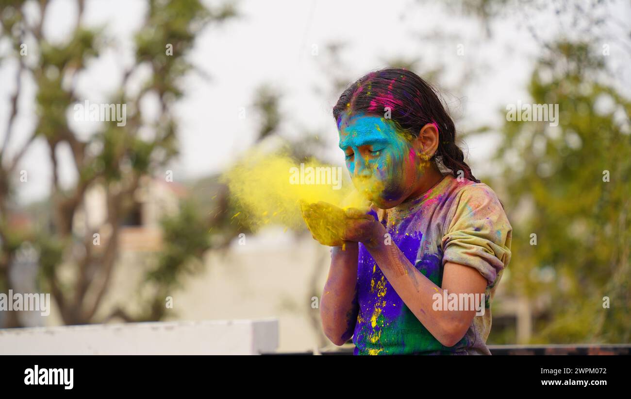 Happy Cute Smiling looking kids playing with paints in their fingers ...