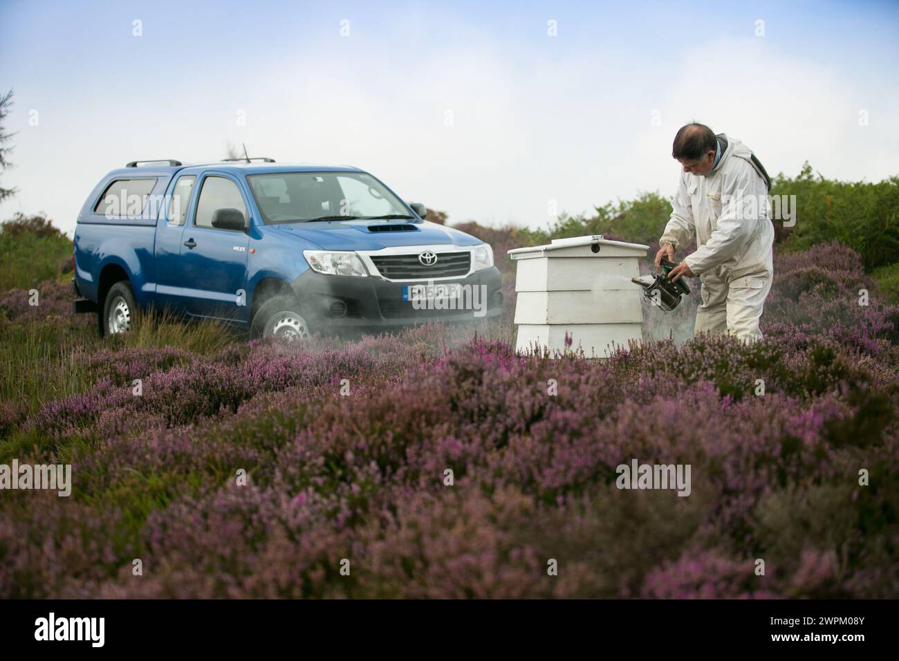 11/09/15 A bee farmer uses his new Toyota Hilux to attend to his ...