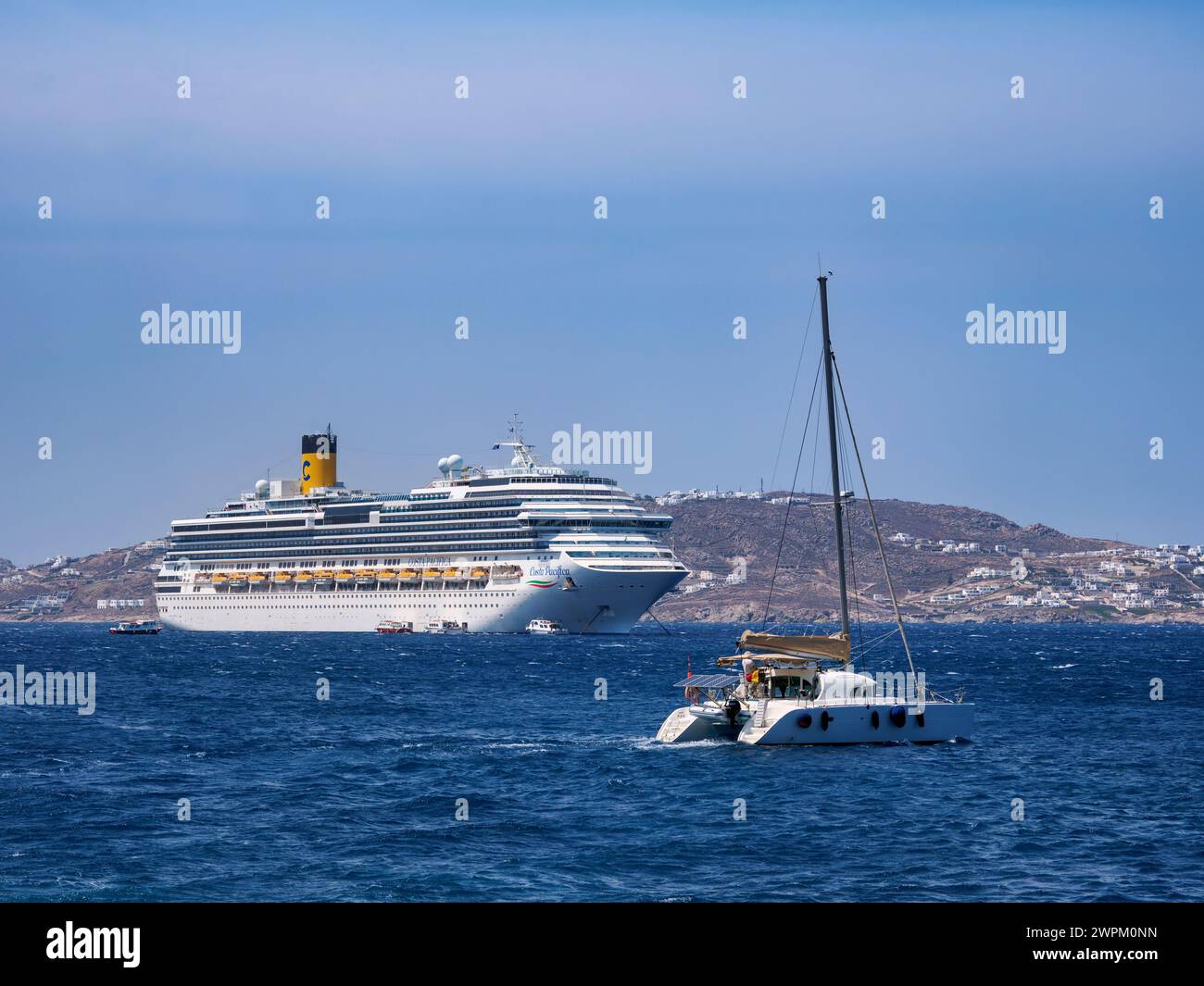 Catamaran and Cruise Ship off the coast of Mykonos Island, Cyclades ...