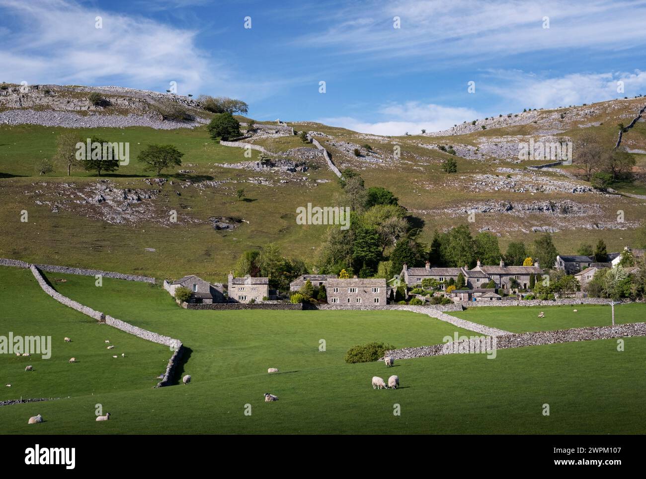 Village of Feizor in spring backed by Pot Scar, Yorkshire Dales ...
