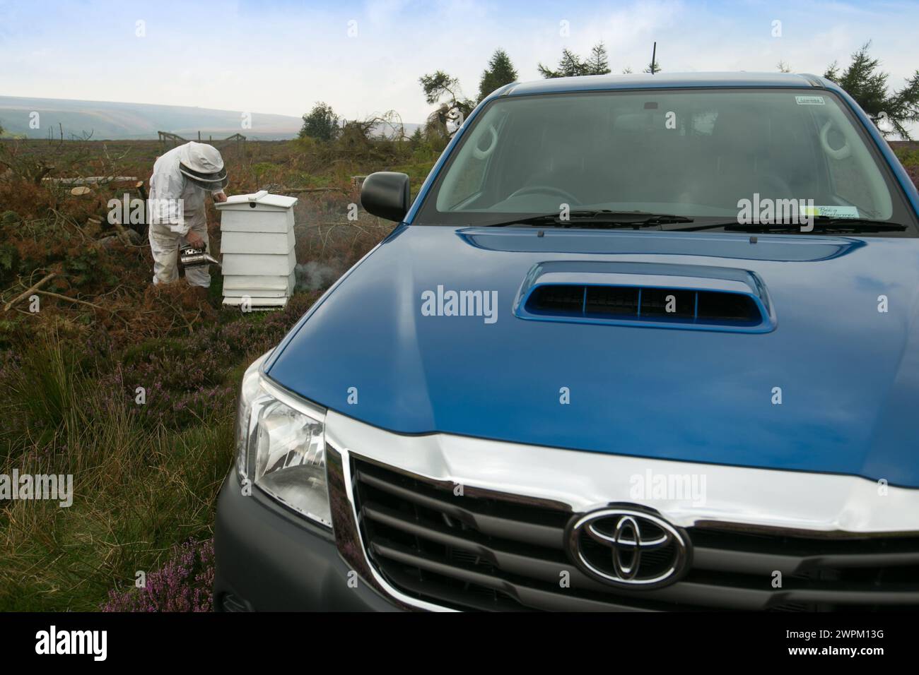 11/09/15 A bee farmer uses his new Toyota Hilux to attend to his ...