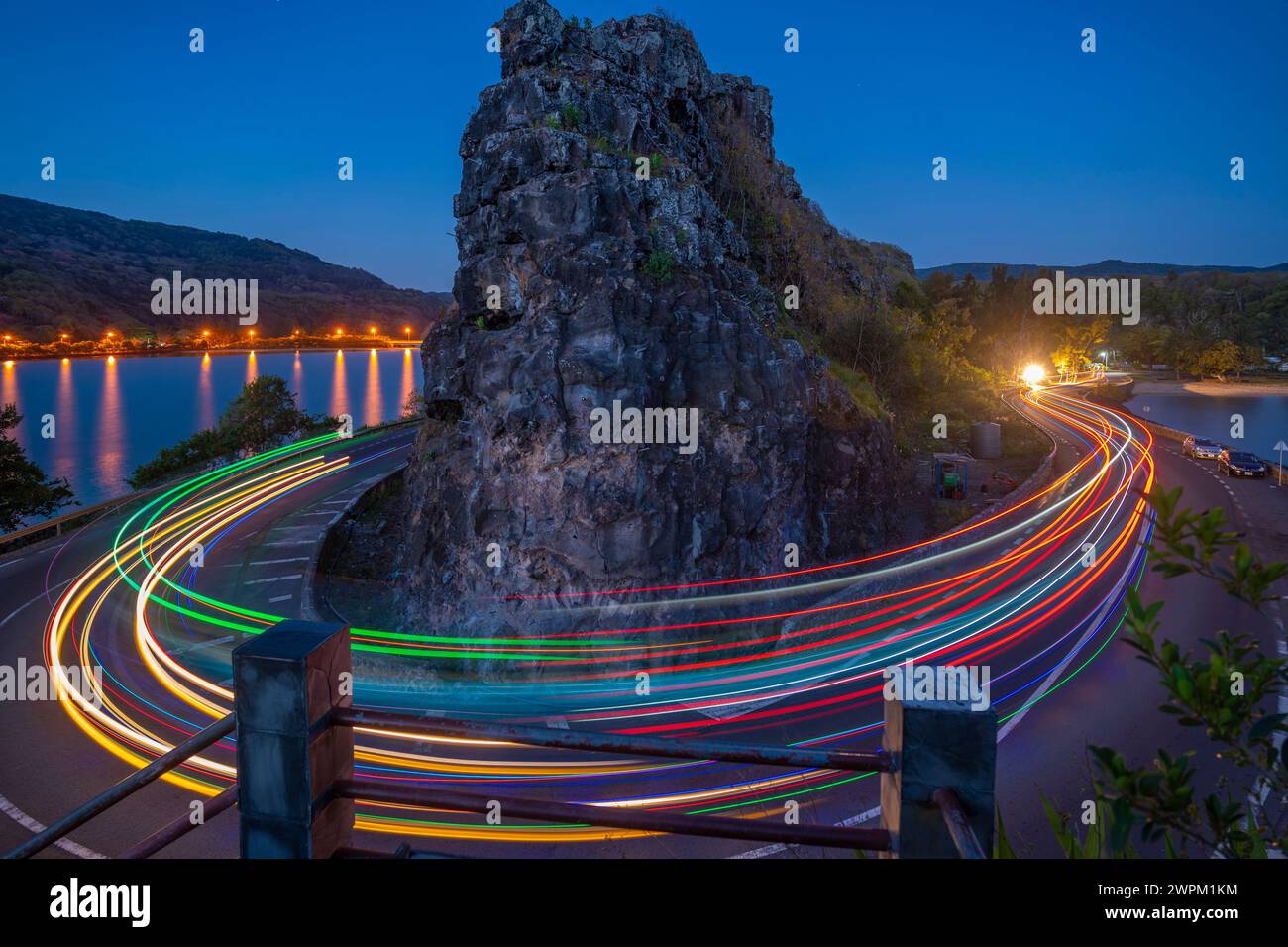 View of trail lights at Baie du Cap from Maconde Viewpoint at dusk ...