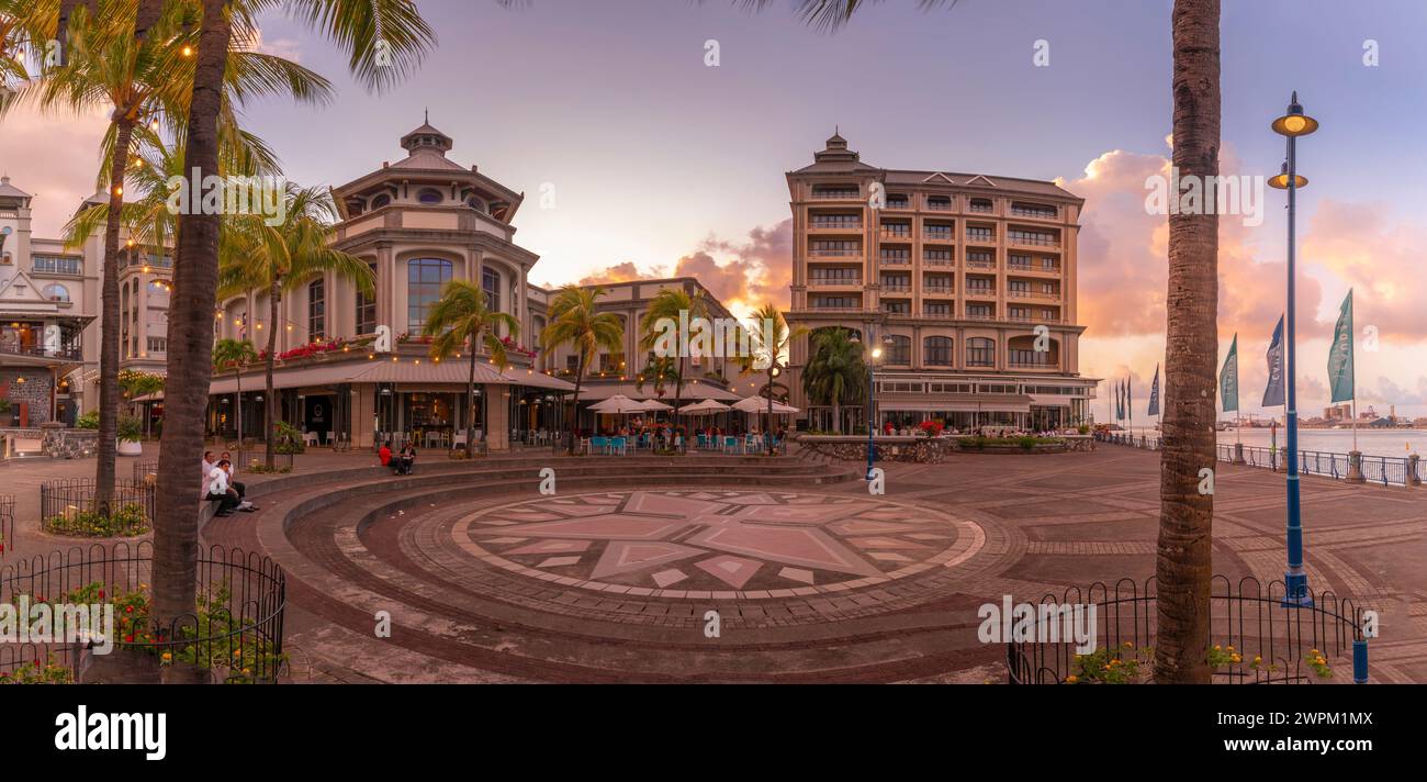 View of Place du Caudan in Caudan Waterfront in Port Louis at sunset ...