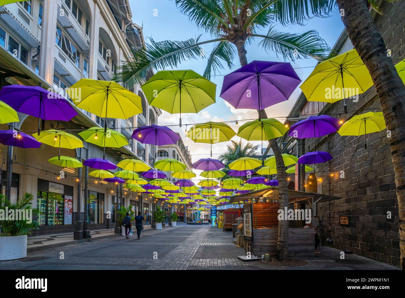 View of Umbrella Square in Caudan Waterfront in Port Louis at sunset ...
