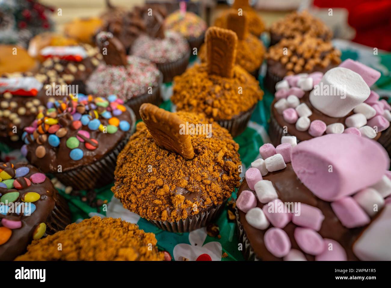 Cakes on Christmas Market stall in Old Market Square at dusk ...