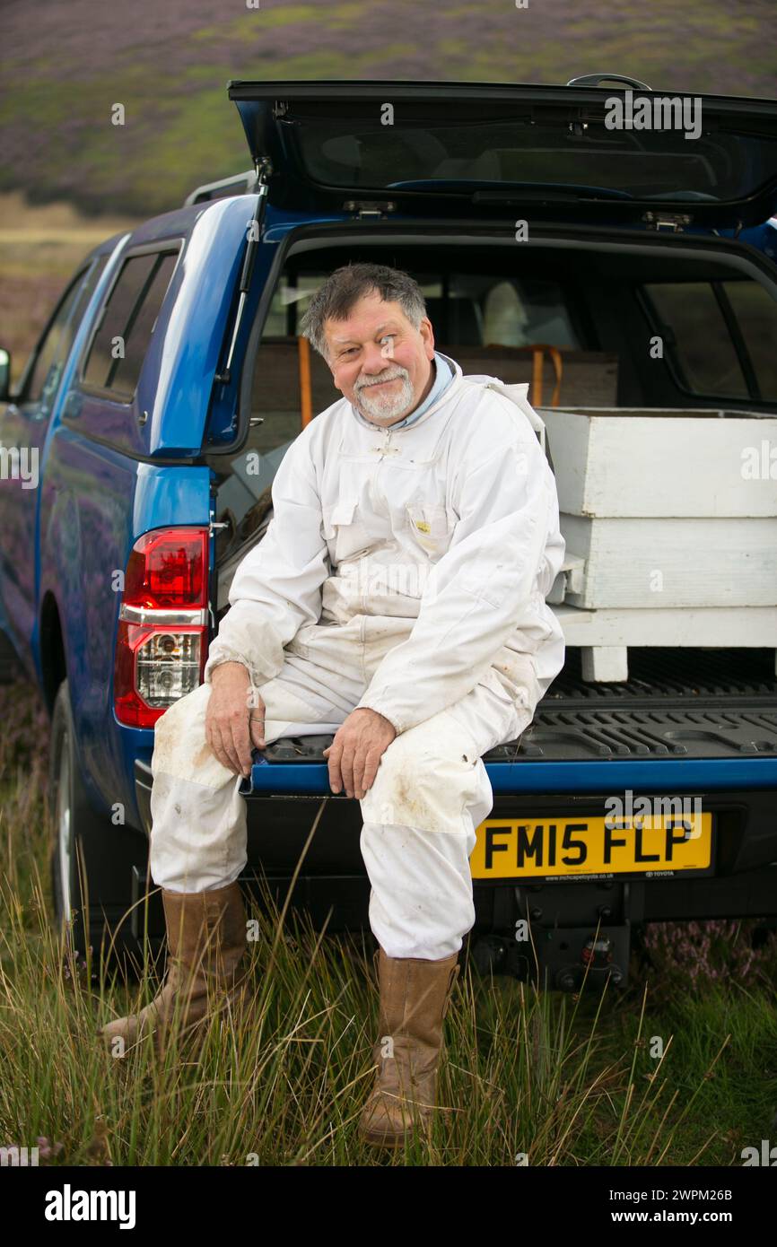 11/09/15 A bee farmer uses his new Toyota Hilux to attend to his ...