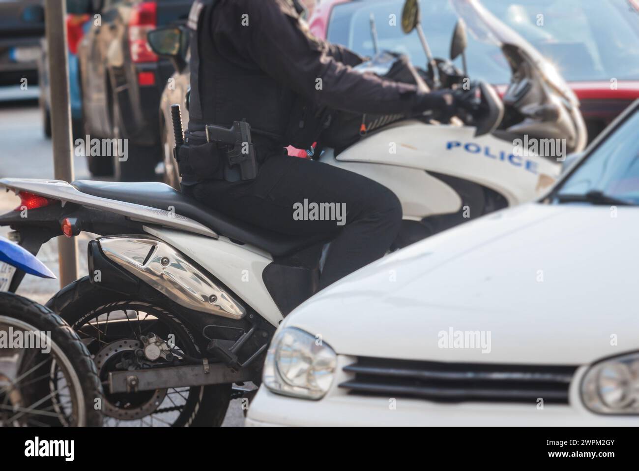 Greek policeman in uniform riding police motorcycle hi-res stock ...