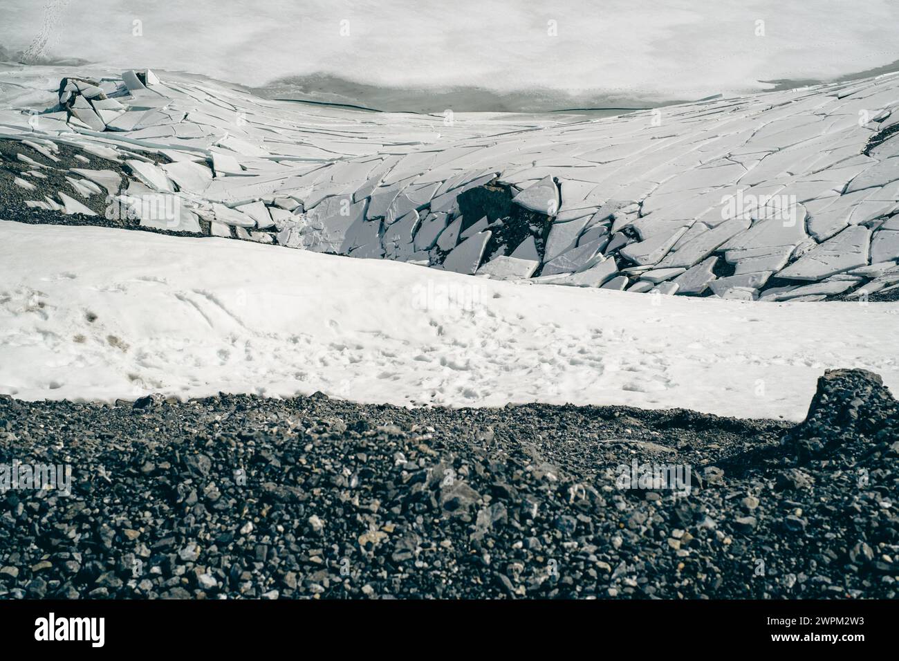 Breaking block of ice Stock Photo - Alamy