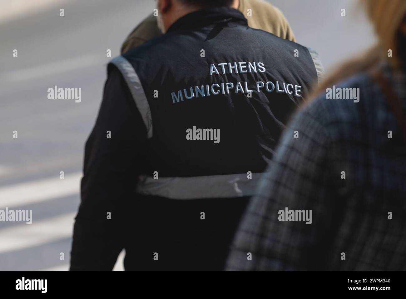Athens Municipal Police with "Municipal Police" logo emblem on uniform ...
