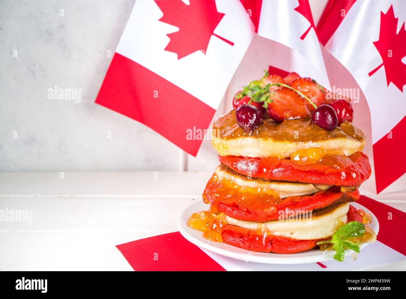 Canada Day concept, brunch menu background. Stack of red and white ...