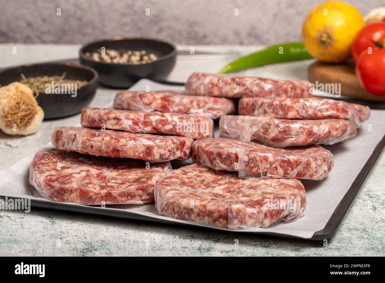 Raw hamburger Patty. Butcher products. Raw hamburger patties with ...