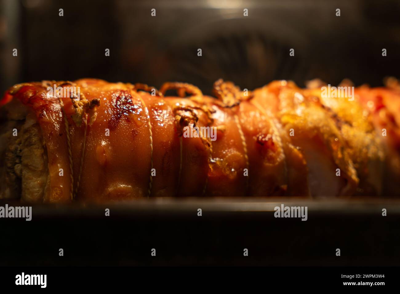 Baked pork wrapped in a roll. Pork roll close-up Stock Photo - Alamy