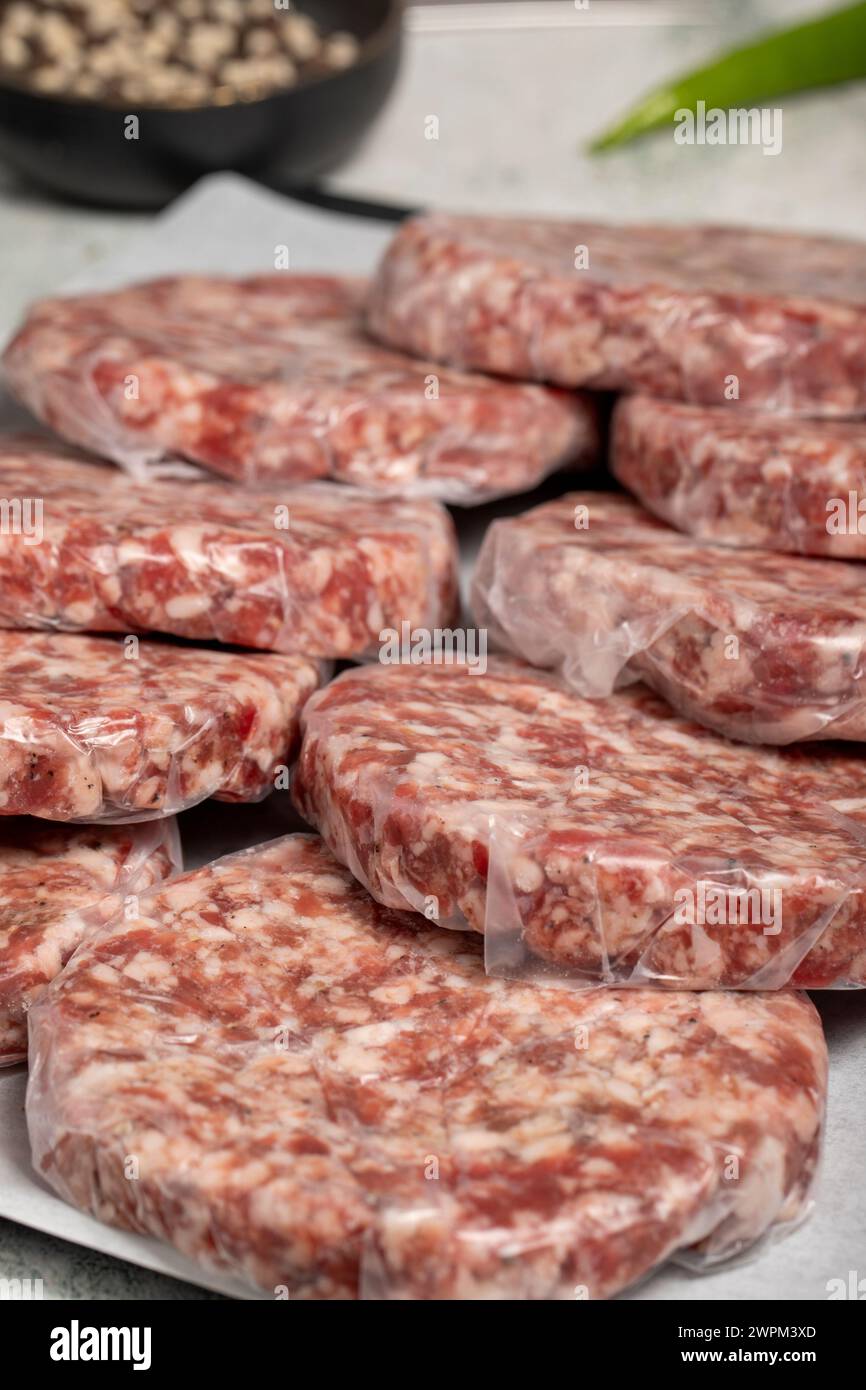Raw hamburger Patty. Butcher products. Raw hamburger patties with ...
