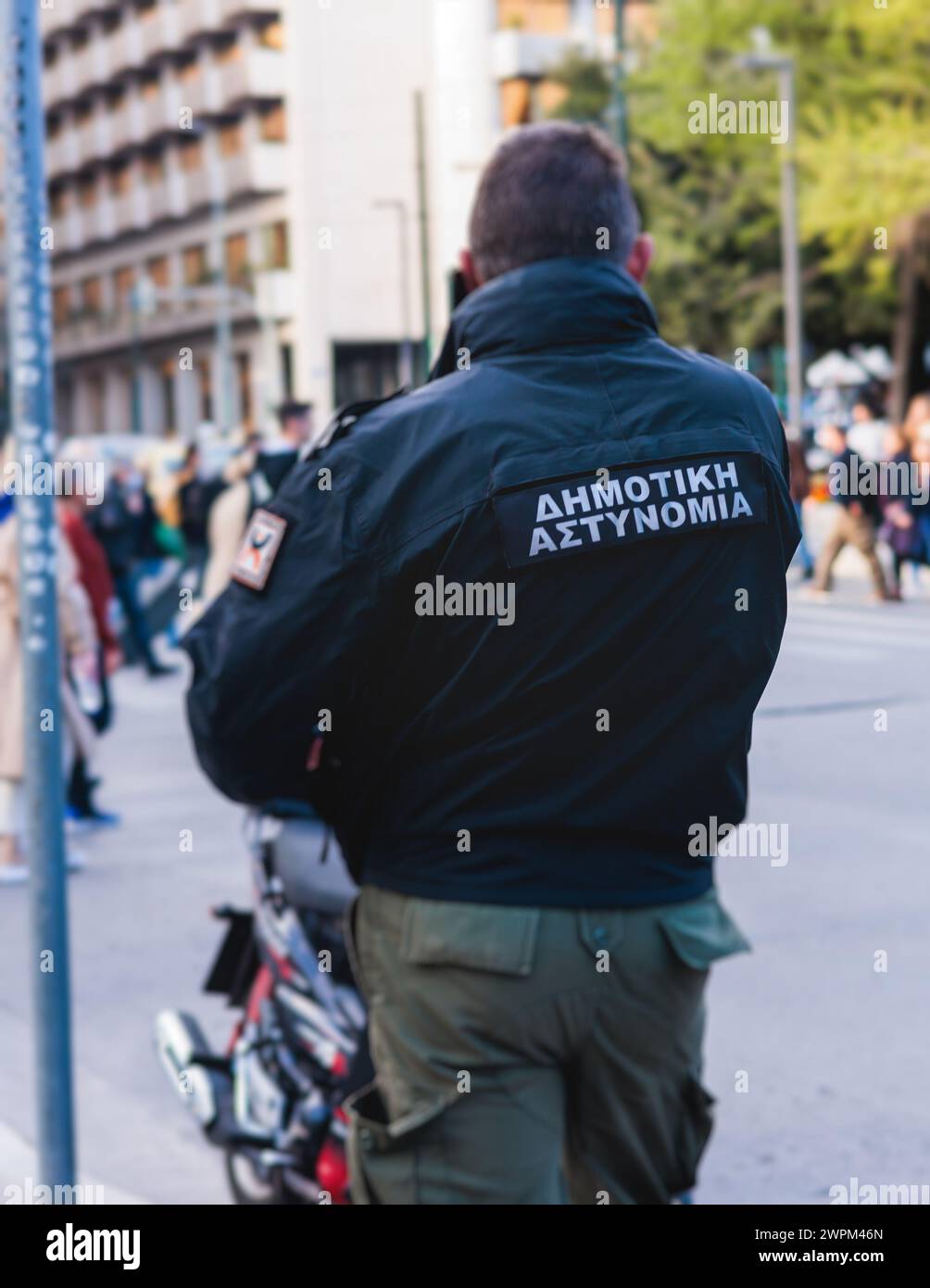 Athens Municipal Police with "Municipal Police" logo emblem on uniform ...