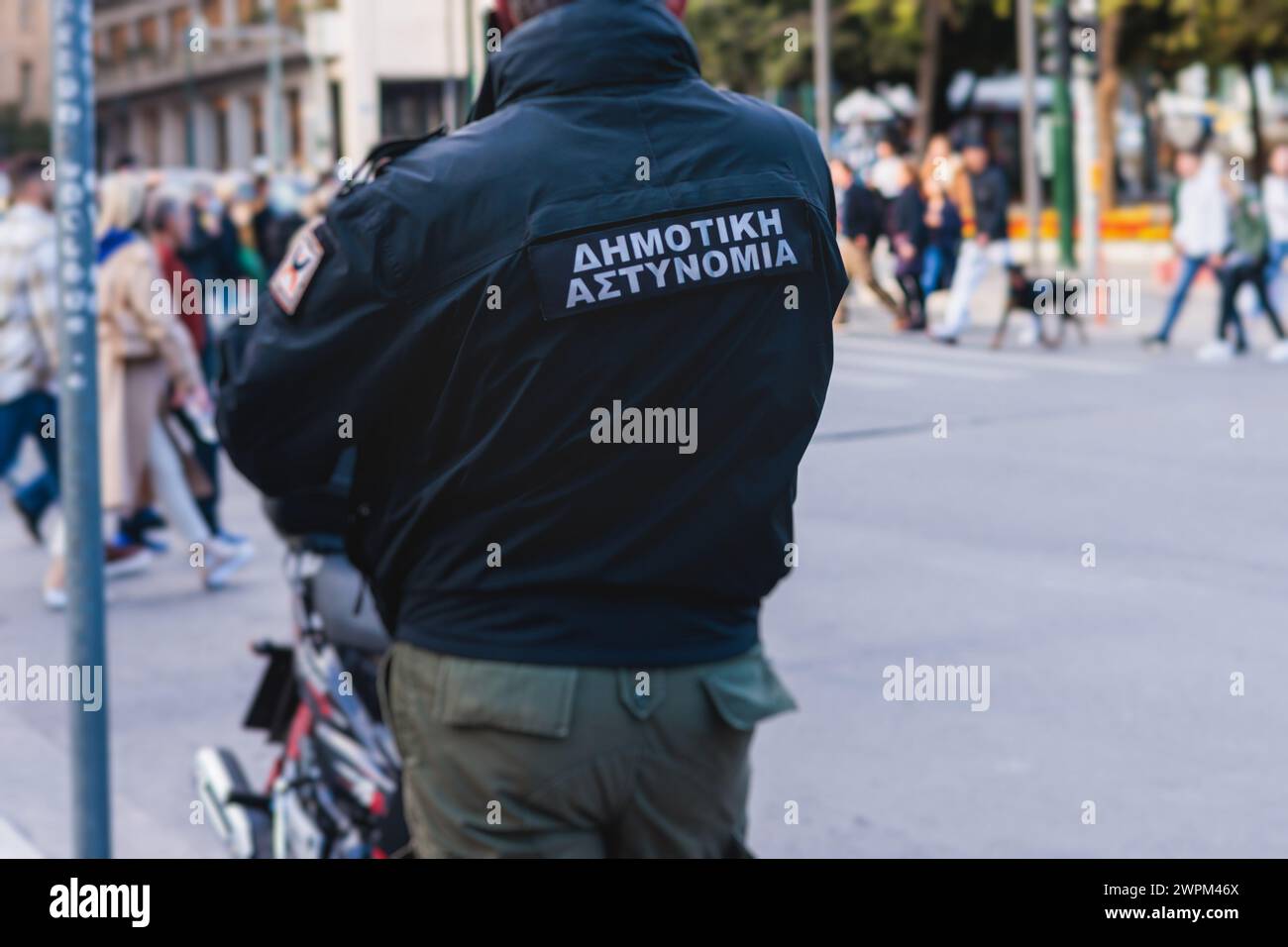 Athens Municipal Police with "Municipal Police" logo emblem on uniform ...