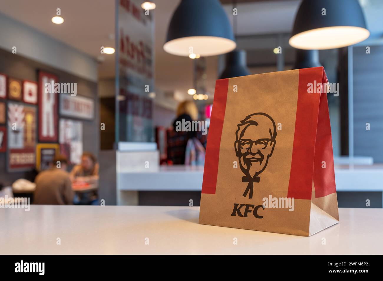 KFC paper bag with Kentucky Fried Chicken on the table of a KFC ...