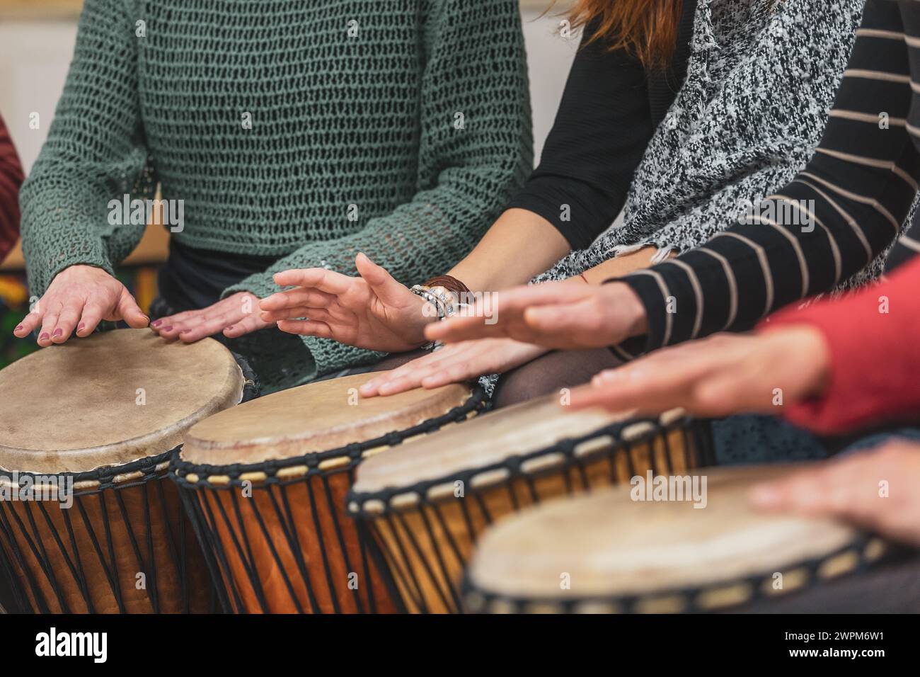 Music therapy concept, a group of people playing different types of ...