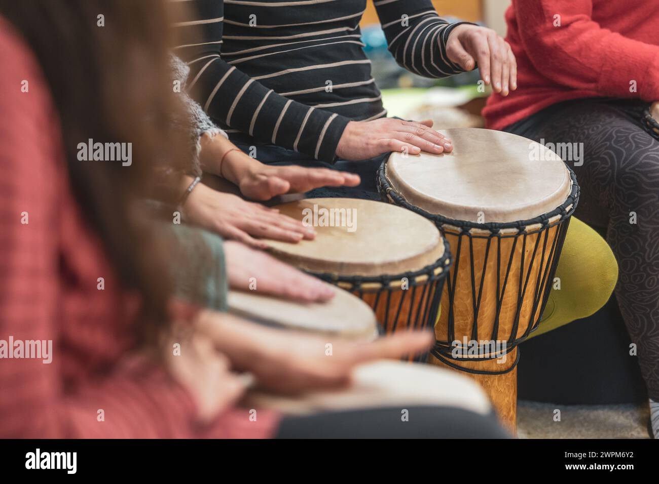 Music therapy concept, a group of people playing different types of ...