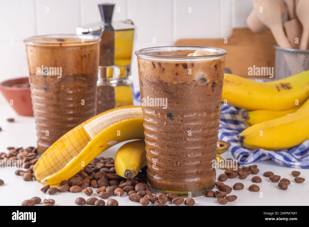 Blended banana coffee. Cold latte coffee and banana non-dairy, vegan ...