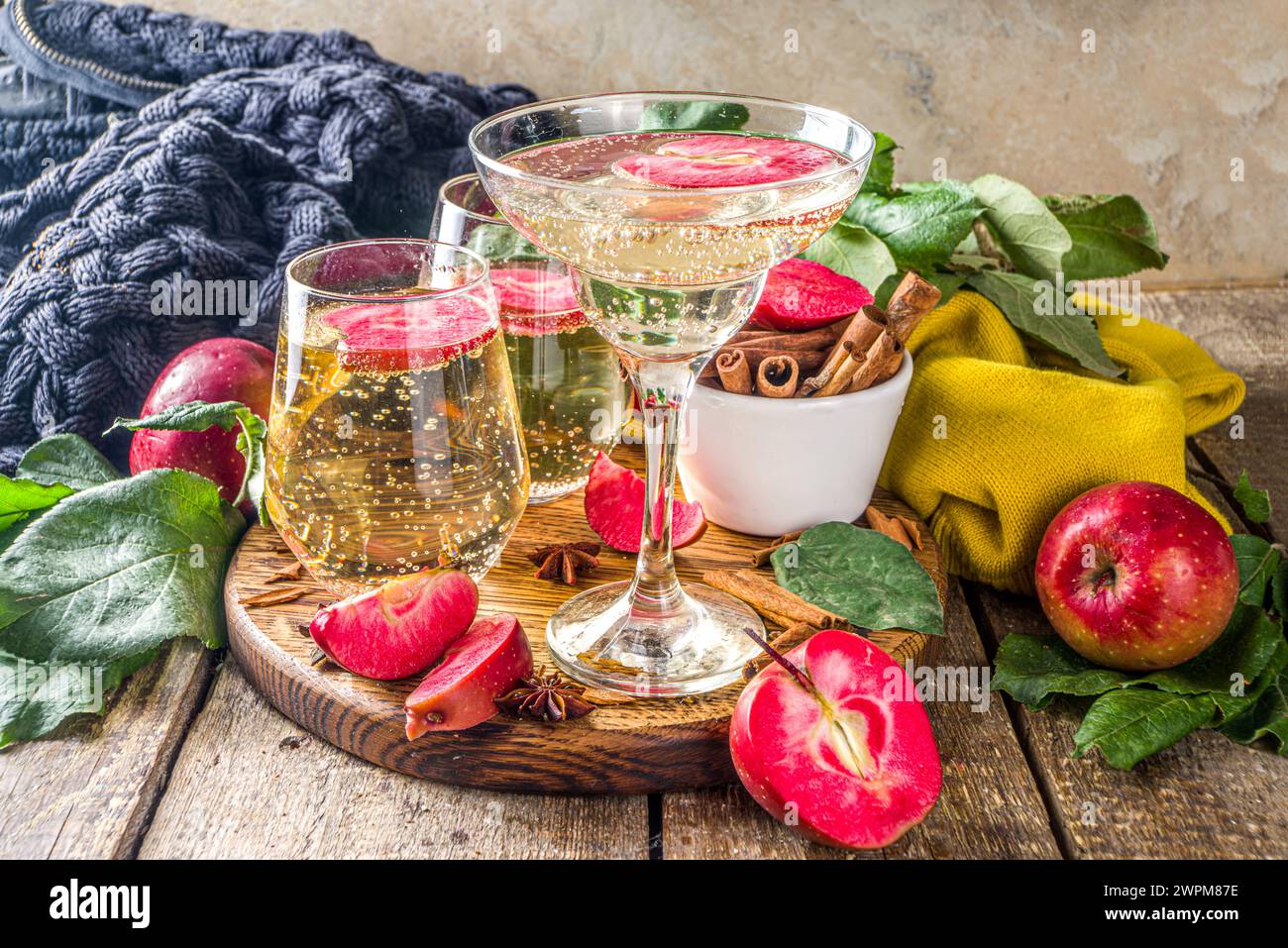 Apple cider drink. Autumn red apples cider martini cocktail, with apple ...