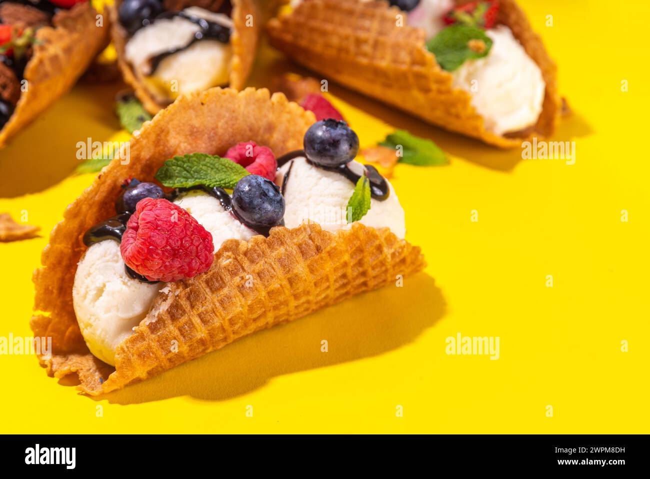 Various sweet taco ice creams. Waffle taco shells with chocolate and ...
