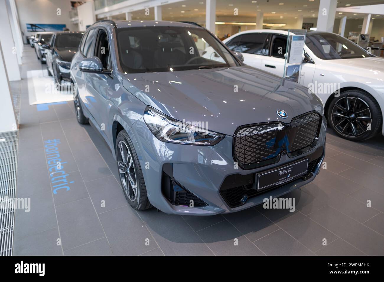 grey BMW iX1 mid-size electric SUV German manufacturer BMW AG, Powerful ...